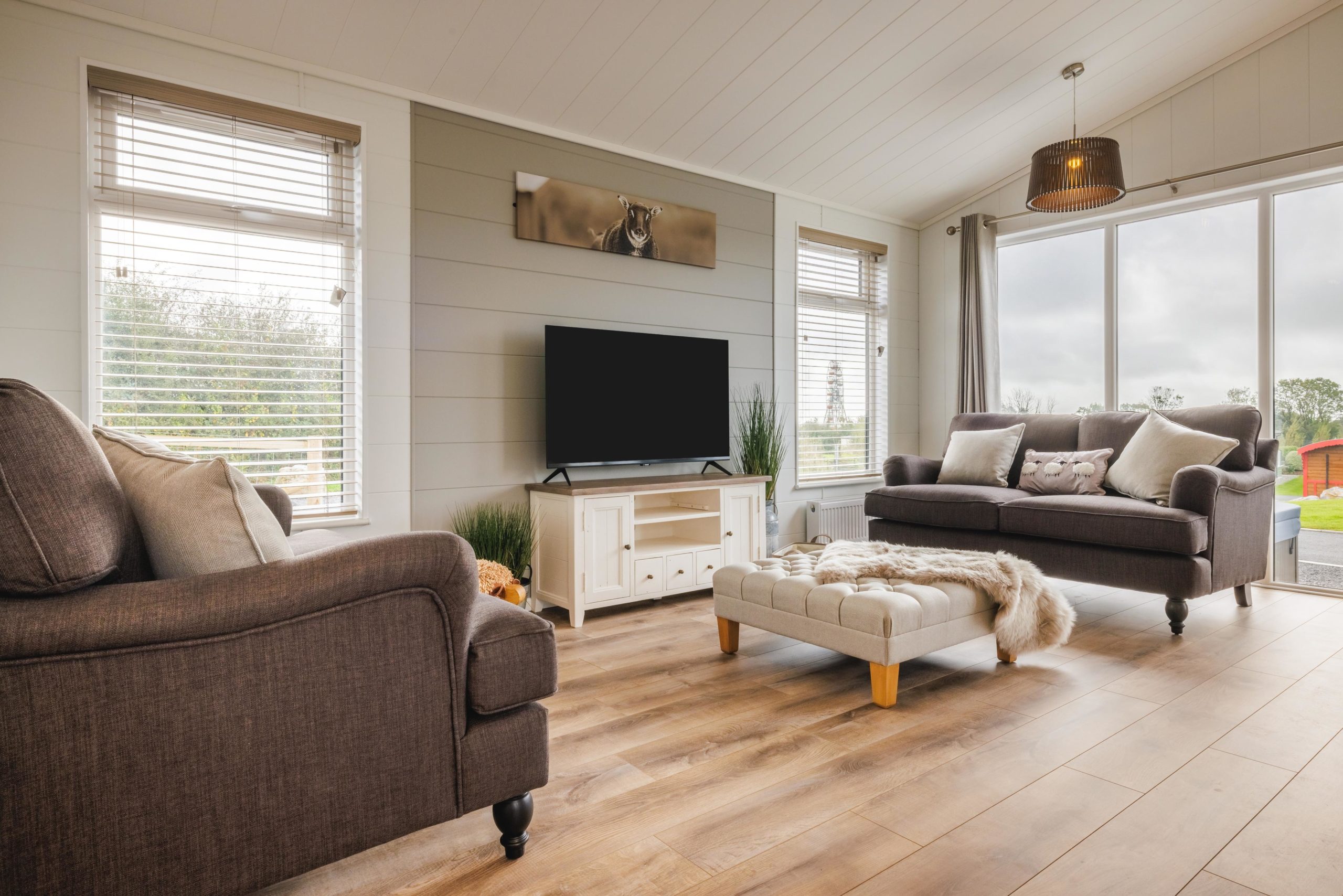 Stay in a Sheep-themed Torwen Lodge • Folly Farm