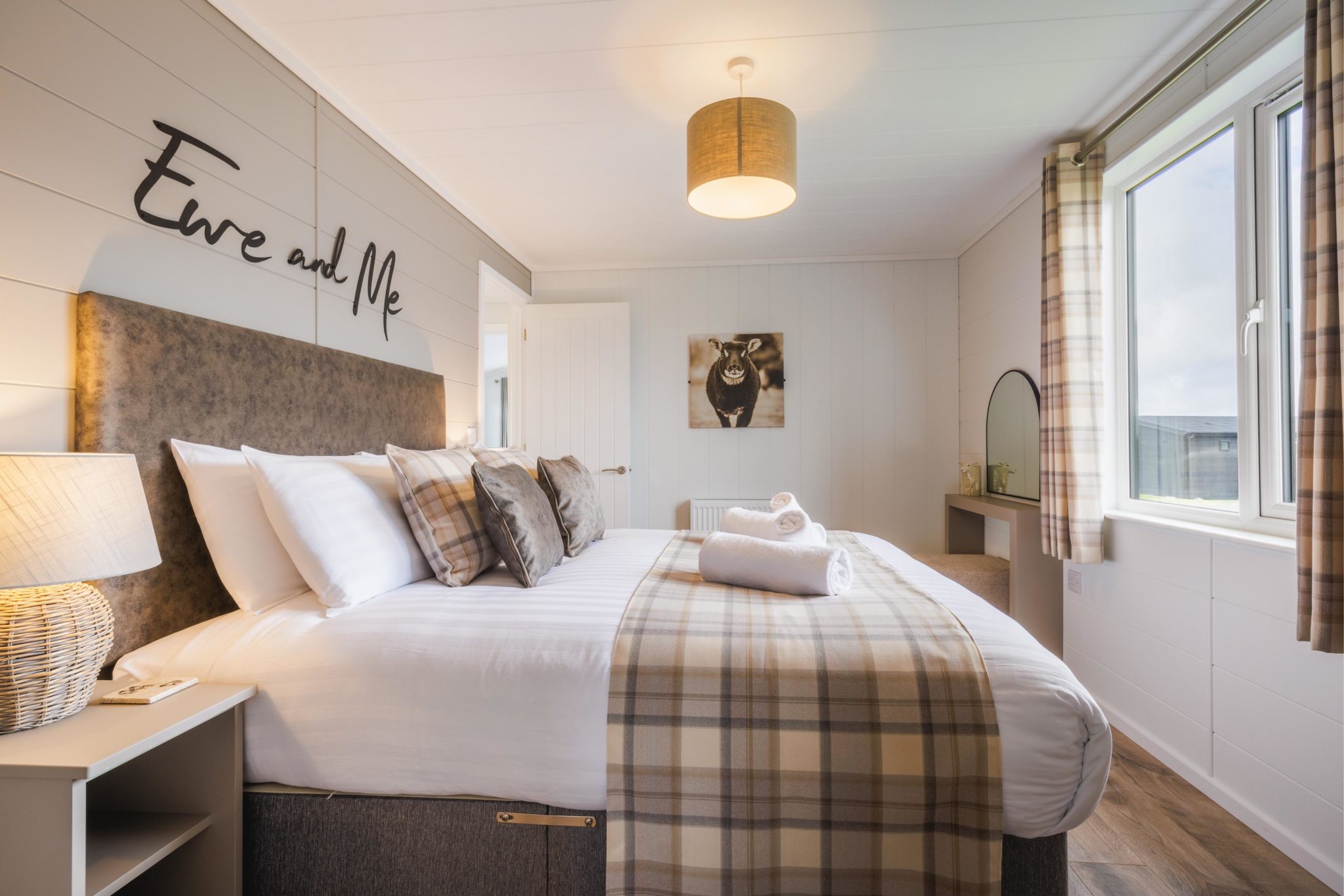 Stay in a Sheep-themed Torwen Lodge • Folly Farm